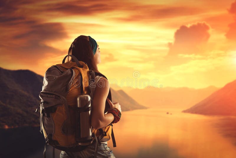 Hiking Girl with Backpack is Looking at Sunset Stock Image - Image of ...