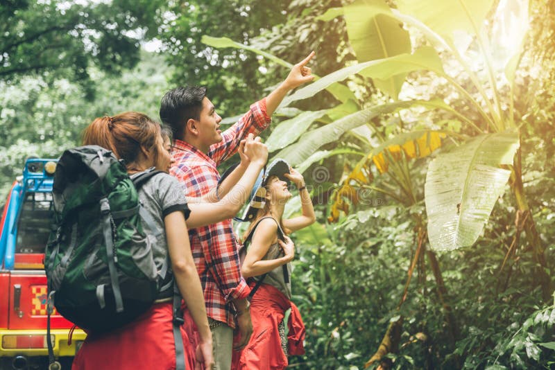 Hiking Hikers Looking At Map Couple Or Friends Navigating Together