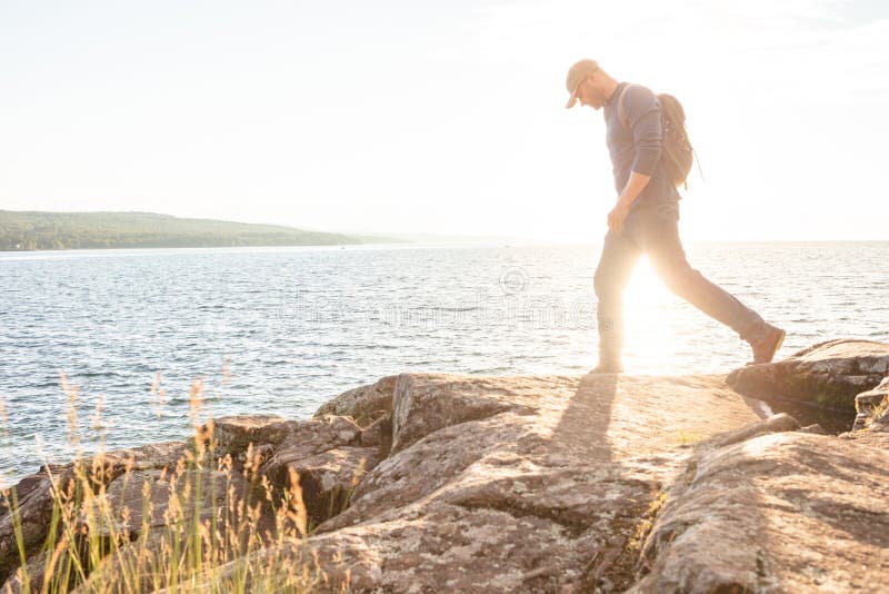 Hiking Makes Exercise Fun. a Man Wearing His Backpack while Out for a ...