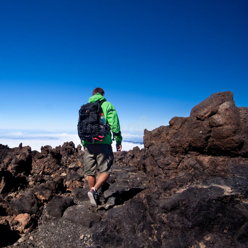 Hiking - Male hiker stock image. Image of cloud, landscape - 33050293