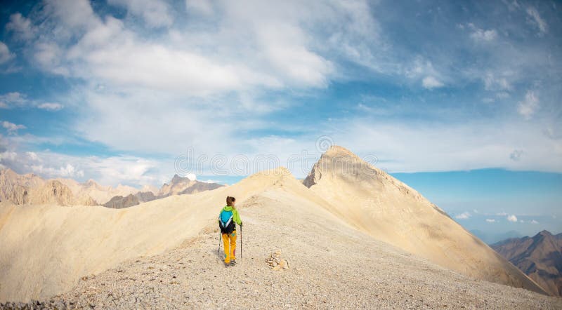 Girl with a Backpack in the Mountains Stock Photo - Image of outdoor ...