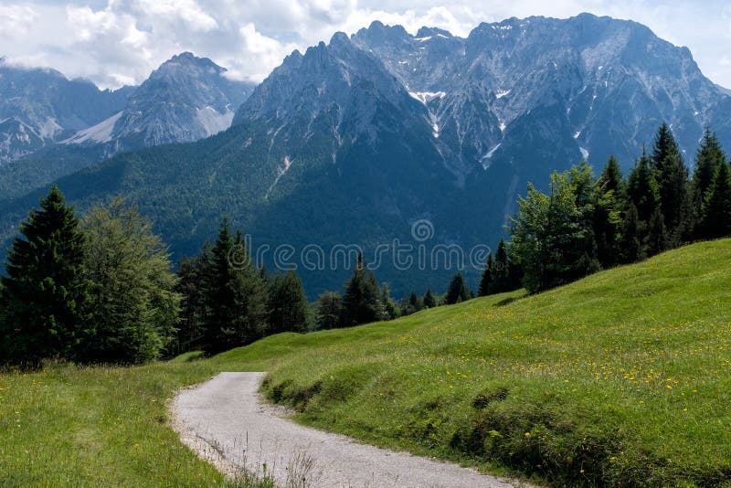Hiking path in Alps stock photo. Image of leisure, hills - 74105540