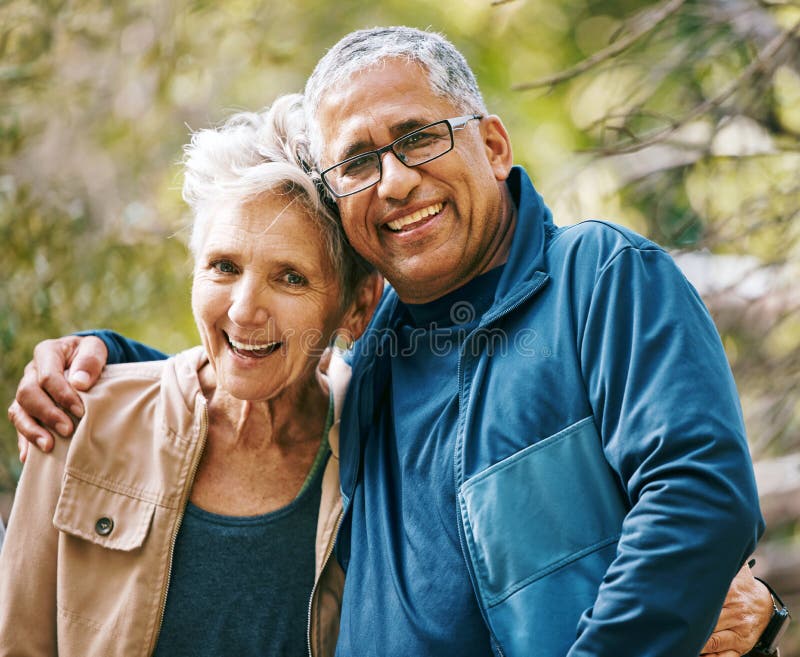 Hiking Portrait And Romance With A Senior Couple Hugging In The Woods