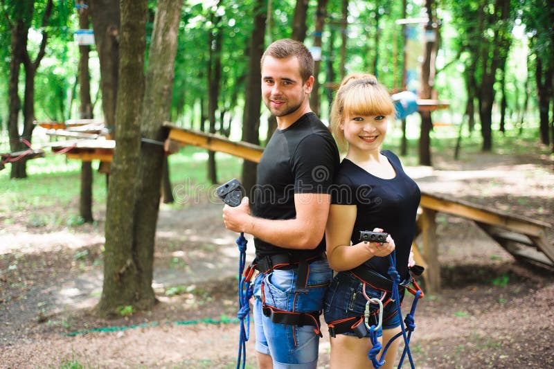 Hiking in the Rope Park Two Young People. Stock Image - Image of action ...