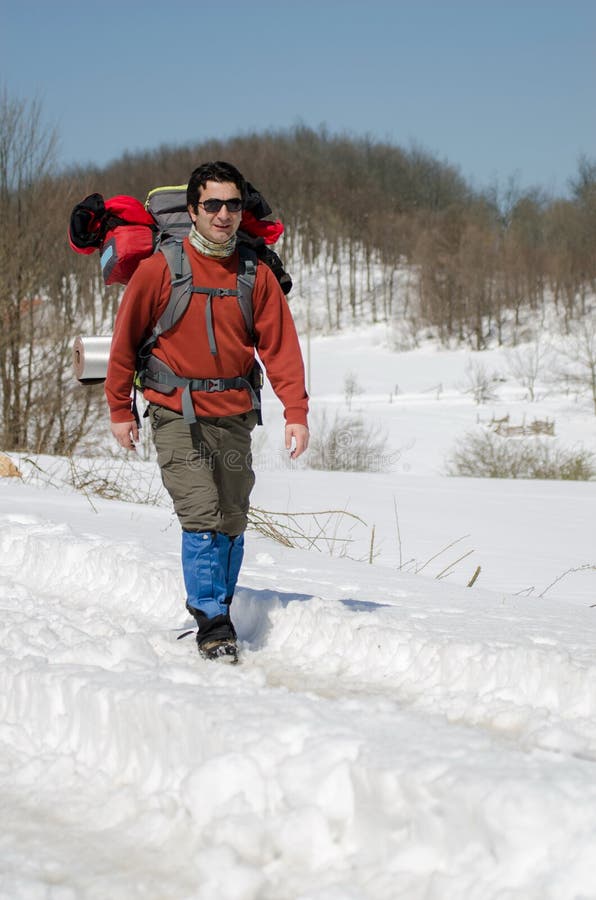 Hiking on snow stock photo. Image of paths, walking, smiling - 57726782
