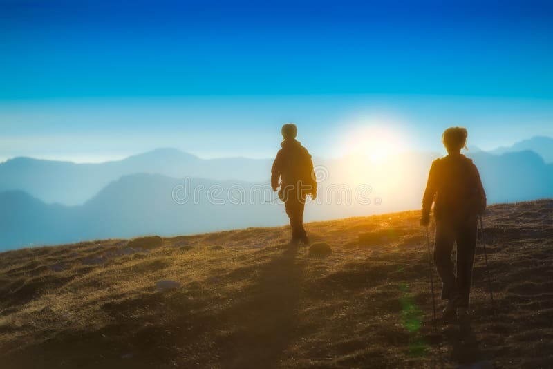 Hiking at Sunset or Sunrise Stock Image - Image of beautiful, mountain ...