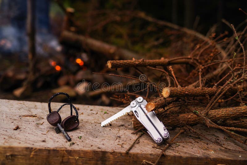 Hiking Tool. Pocket Tool. Light a Fire in the Forest. Outdoors. Stock ...