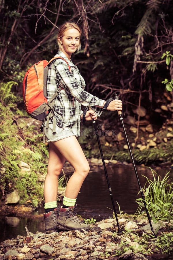 Hiking Young Woman stock photo. Image of shorts, creek - 91995748