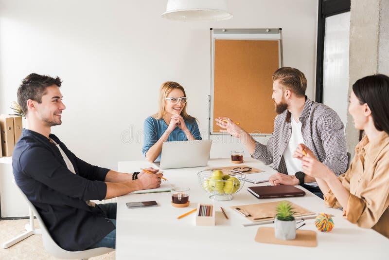 Hilarious Co-workers Discussing Certain Issues Stock Image - Image of ...