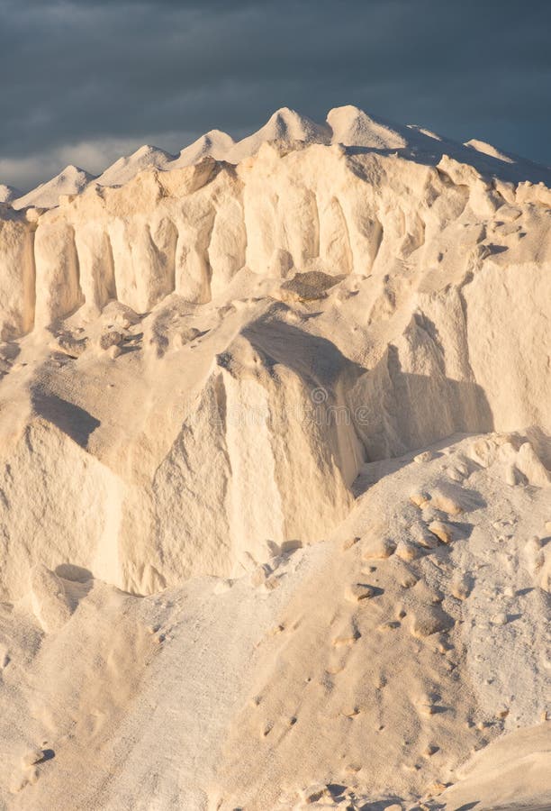 Hill of Salt in Evening Sun Stock Photo - Image of refinery ...