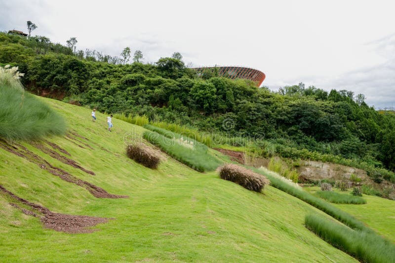 Hillside Lawn with Modern Viewing Platform in Background Editorial ...
