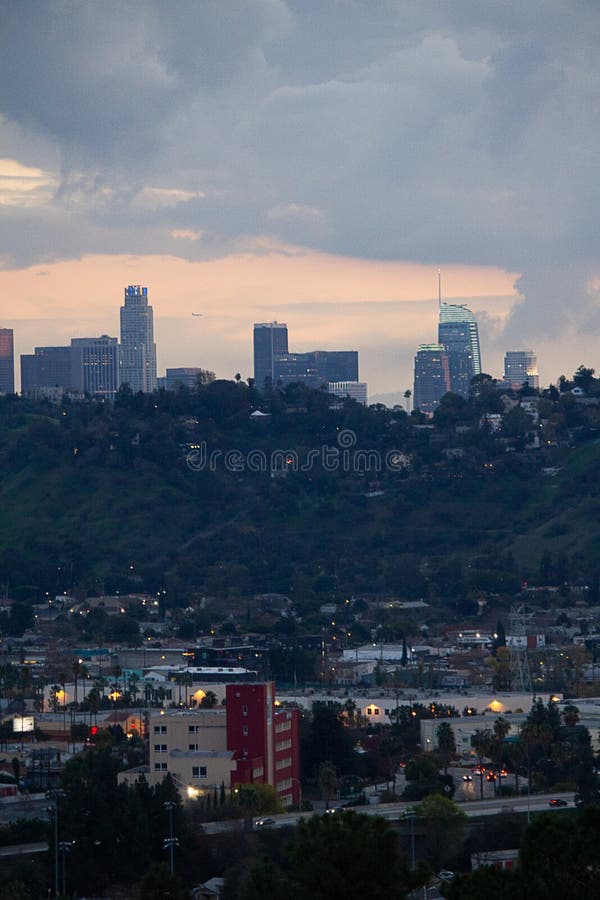 Hillside View of Homes and Streets with Panoramic Sky in Pink and ...