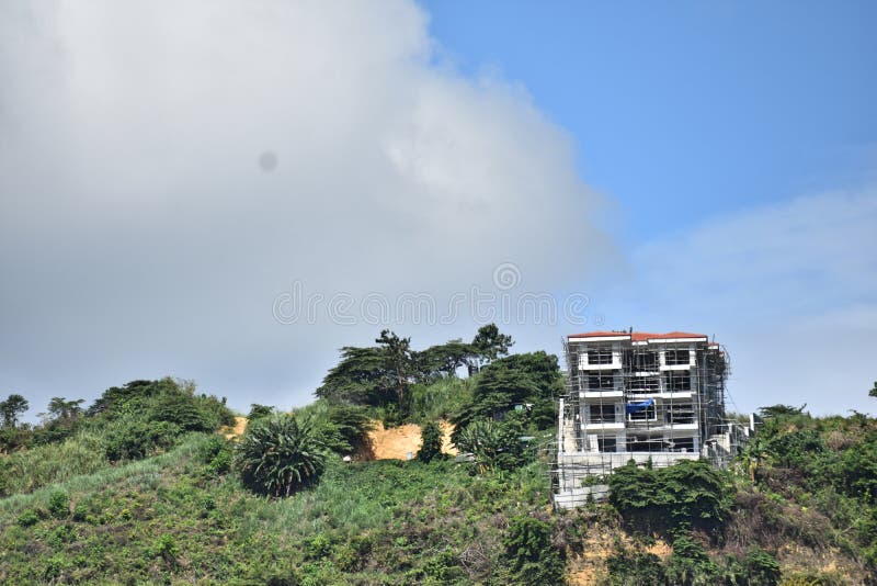 A Hilltop Building and Cloudy Sky Stock Photo - Image of clouds, hill ...