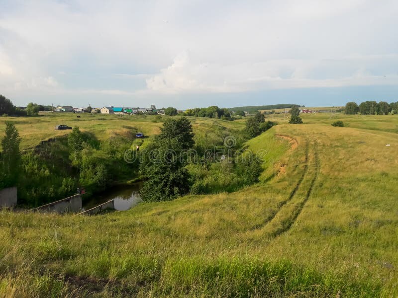 Hilly Field with Yellowing Grass Stock Image - Image of mountain, hill ...