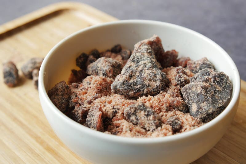 Himalayan Black Salt Rock Crystals, Kala Namak in a Container on Table ...