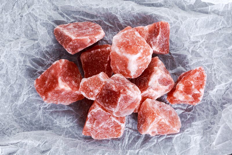 Himalayan Pink Crystal Salt on Crumpled Paper Stock Photo - Image of ...