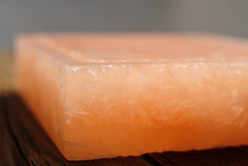Himalayan pink salt block stock image. Image of wood - 47551599