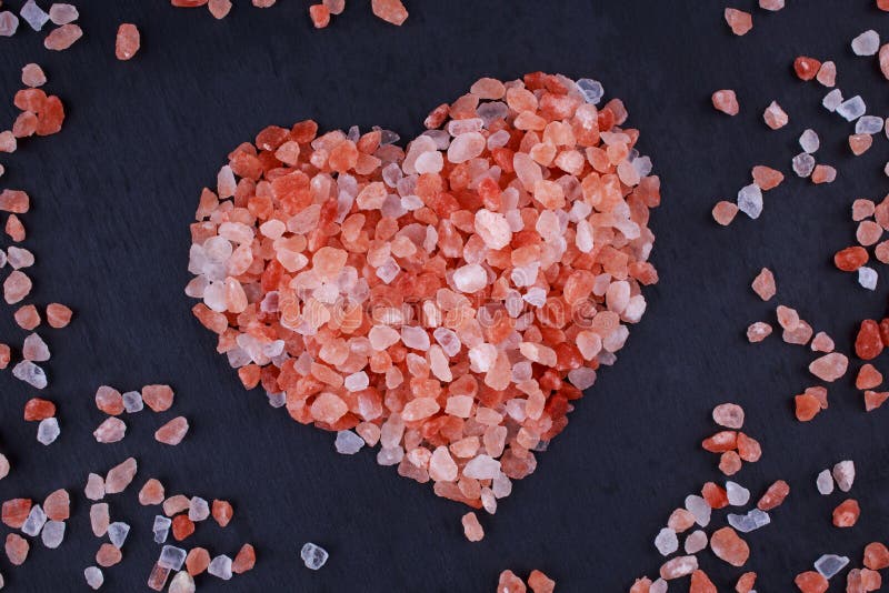 Himalayan pink salt stock image. Image of heart, natural - 140829689