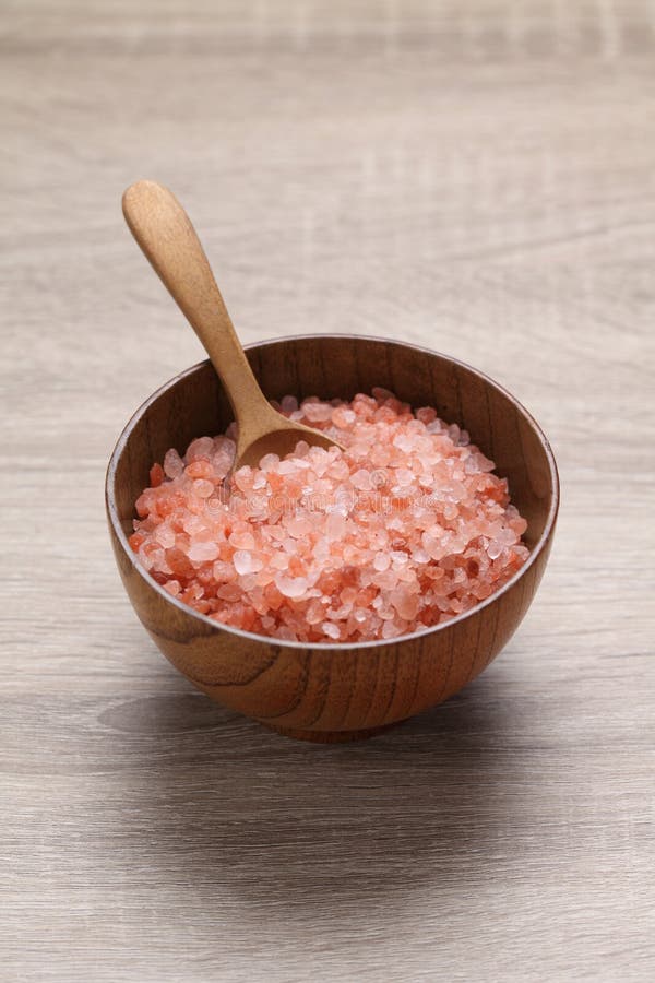Himalayan Pink Salt in Wooden Cup on Table Stock Photo - Image of ...