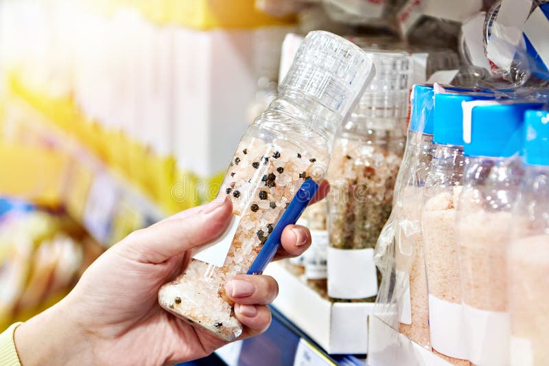 Himalayan salt in hand stock photo. Image of label, cuisine - 312045642