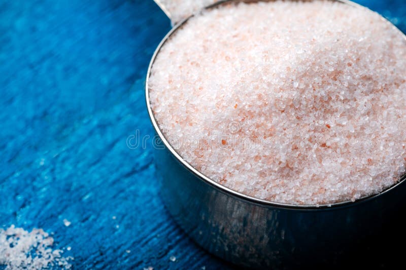 Himalayan Salt in Measuring Spoon on Wooden Background. Stock Photo ...