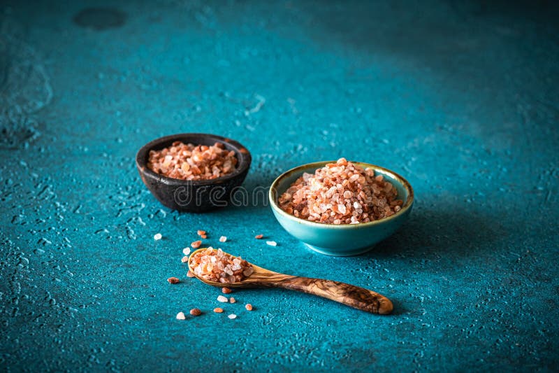 Himalayan Salt in Small Bowls on Blue Background Stock Photo - Image of ...