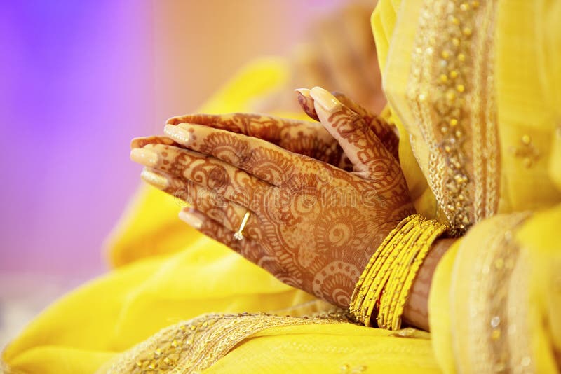 Hindu Bride Crossing Hands for Prayer on Wedding Eve. Stock Image ...