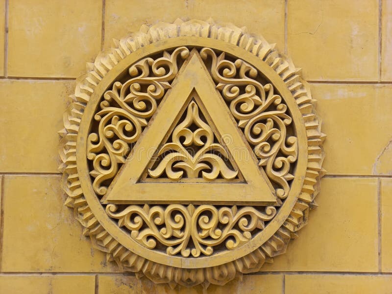 Hindu Design Sculpture of a Triangle Inside a Circle in the Stone Wall ...