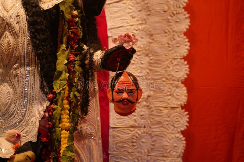 The Hindu Goddess Kali Has a Human Head in One Hand. Stock Image ...