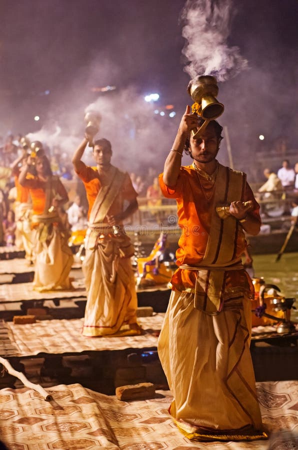A Hindu Priest Performs the Ganga Aarti Ritual in Varanasi. Editorial ...