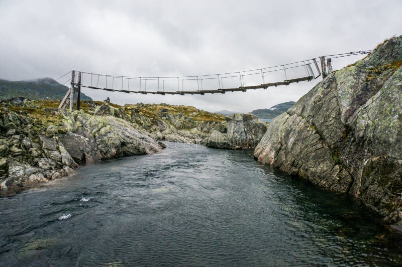 Hinged Bridge Over Mountain River Stock Image - Image of beautiful ...