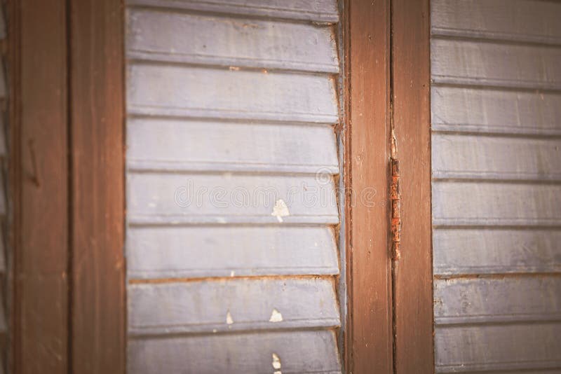 The Hinges of the Windows in the Ancient Wooden House that are Rusty ...