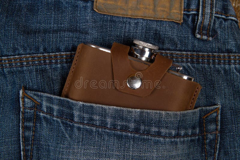 Hip flask in jeans pocket stock photo. Image of sleeve - 267992304