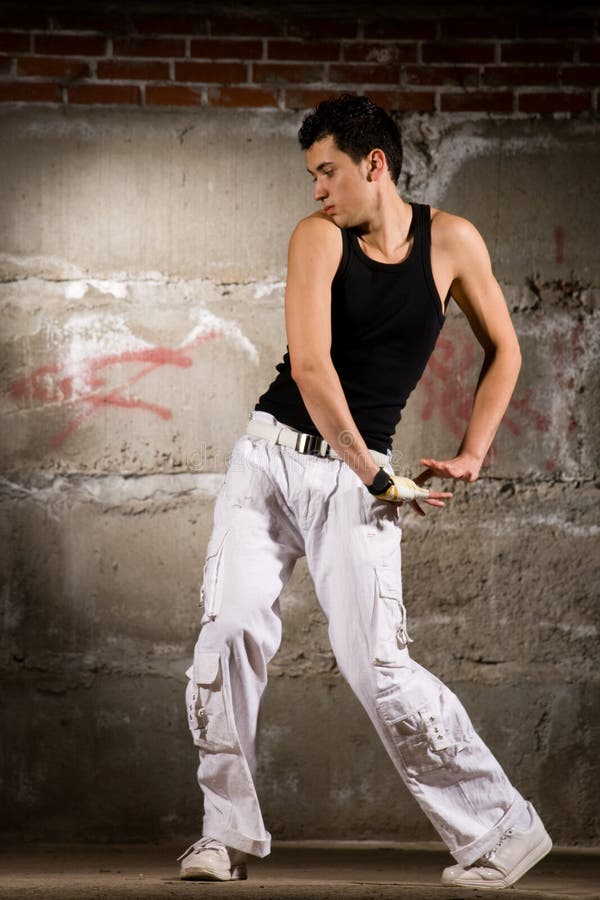 Hip Hop Boy Dancing in Modern Style Over Grey Wall Stock Photo - Image ...