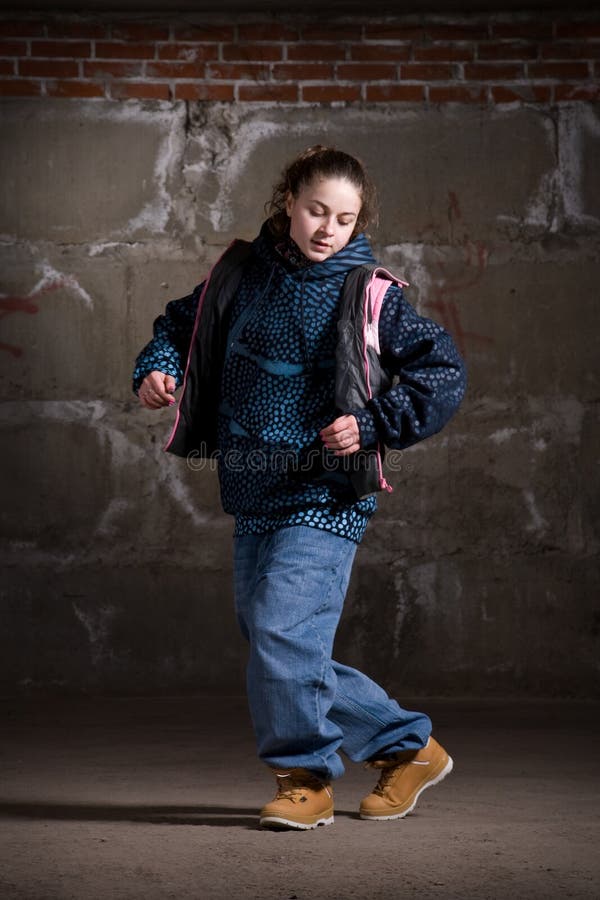 Hip Hop Dancer in Modern Style Over Brick Wall Stock Image - Image of ...