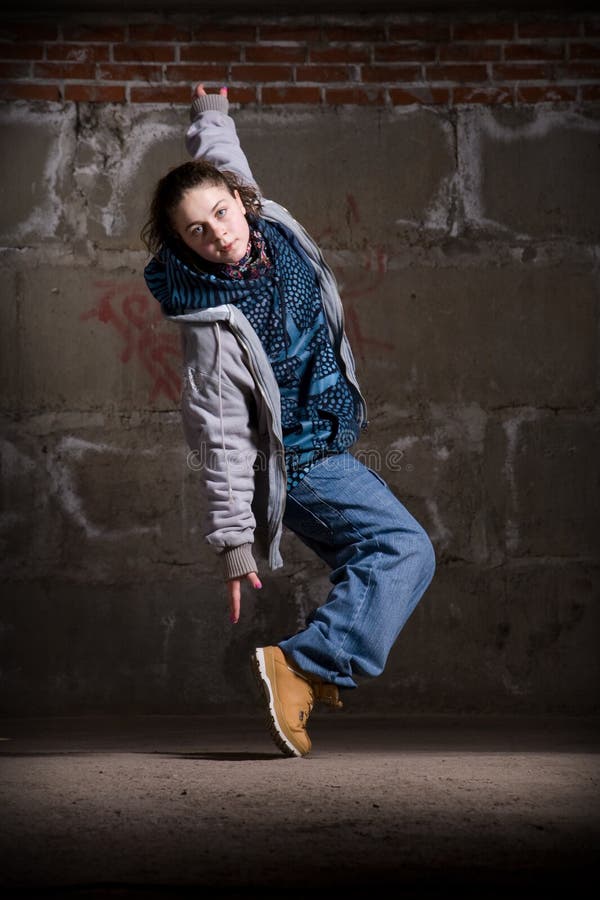Hip Hop Dancer in Modern Style Over Brick Wall Stock Image - Image of ...