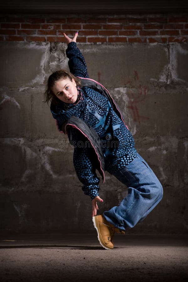Hip Hop Dancer in Modern Style Over Brick Wall Stock Photo - Image of ...