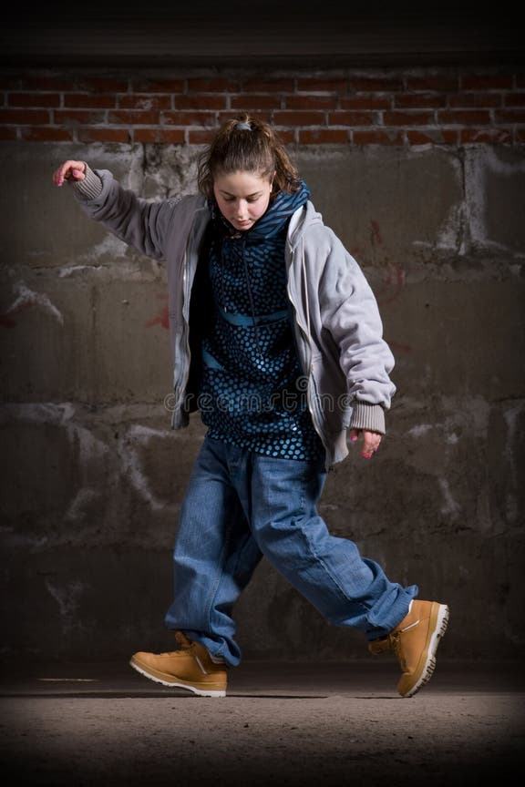 Hip Hop Dancer in Modern Style Over Brick Wall Stock Image - Image of ...