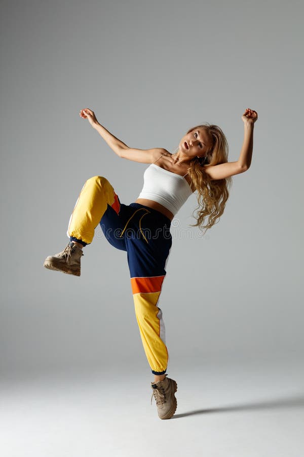 Hip Hop Dancer Moving and Jumping in Studio Stock Photo - Image of ...