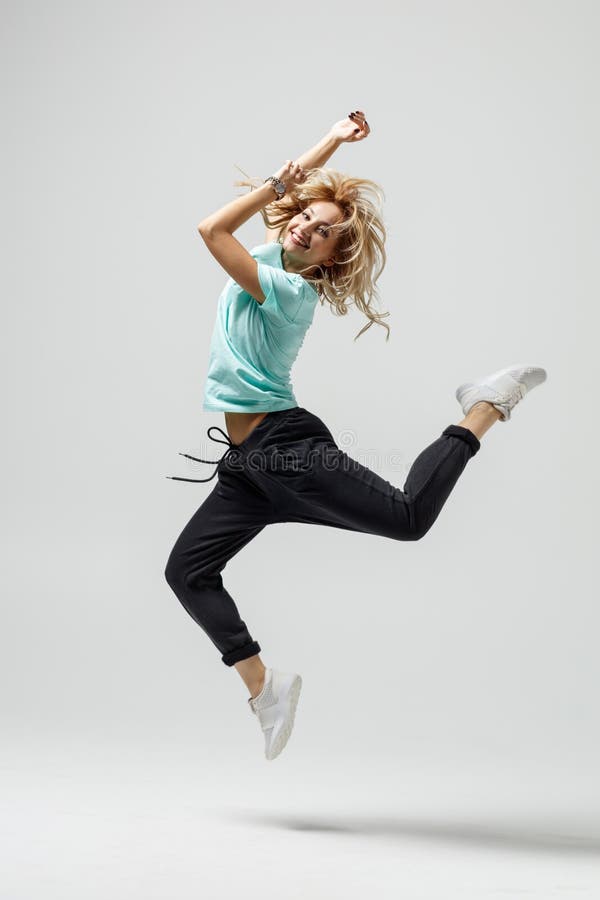 Hip Hop Dancer Moving and Jumping in Studio Stock Image - Image of ...