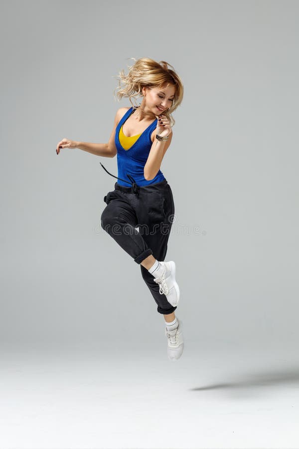 Hip Hop Dancer Moving and Jumping in Studio Stock Image - Image of ...