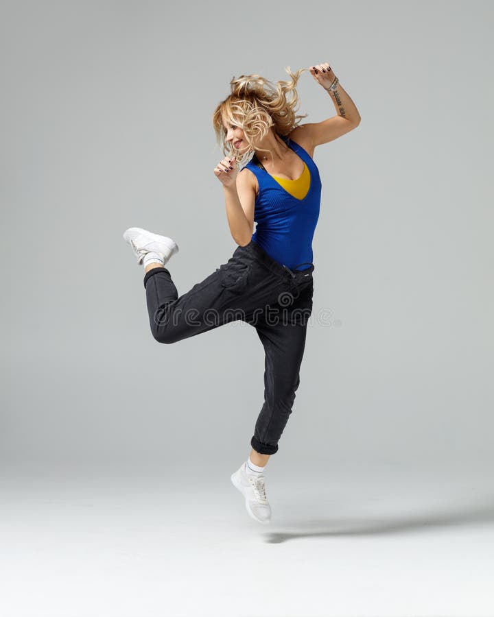 Hip Hop Dancer Moving and Jumping in Studio Stock Image - Image of ...