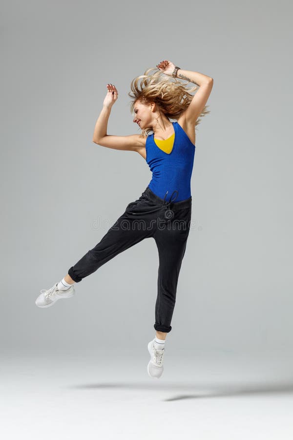 Hip Hop Dancer Moving and Jumping in Studio Stock Image - Image of ...