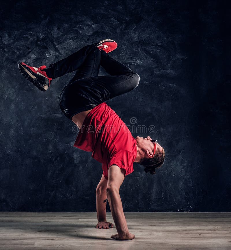 Hip-hop Style Dancer Performs Breakdance Acrobatic Elements. Stock ...