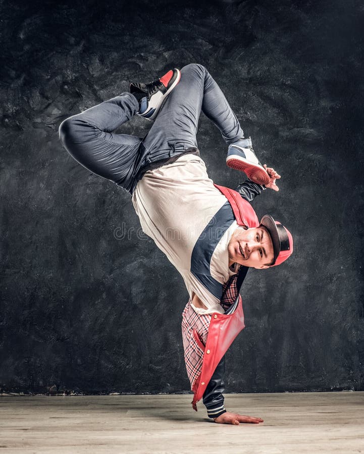 Hip-hop Style Dancer Performs Breakdance Acrobatic Elements. Stock ...