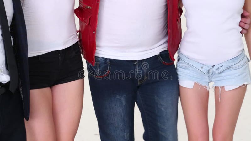 Hips of Two Dancing Men and Three Girls in Shorts Stock Video - Video ...