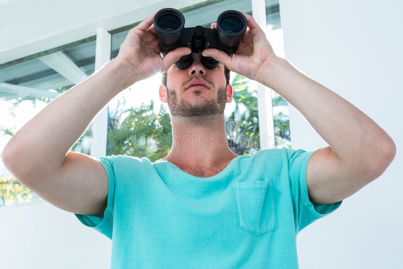 Hipster Man Looking through Binoculars Stock Photo - Image of standing ...