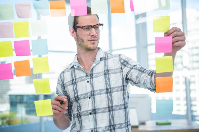 Hipster Man Looking at Post-it Stock Image - Image of agency, notes ...