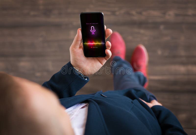 Man Using Virtual Assistant, Smart Speaker at Home Stock Photo - Image ...