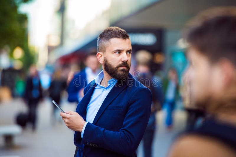 Young Man with Smartphone on Sunny Street Stock Image - Image of road ...